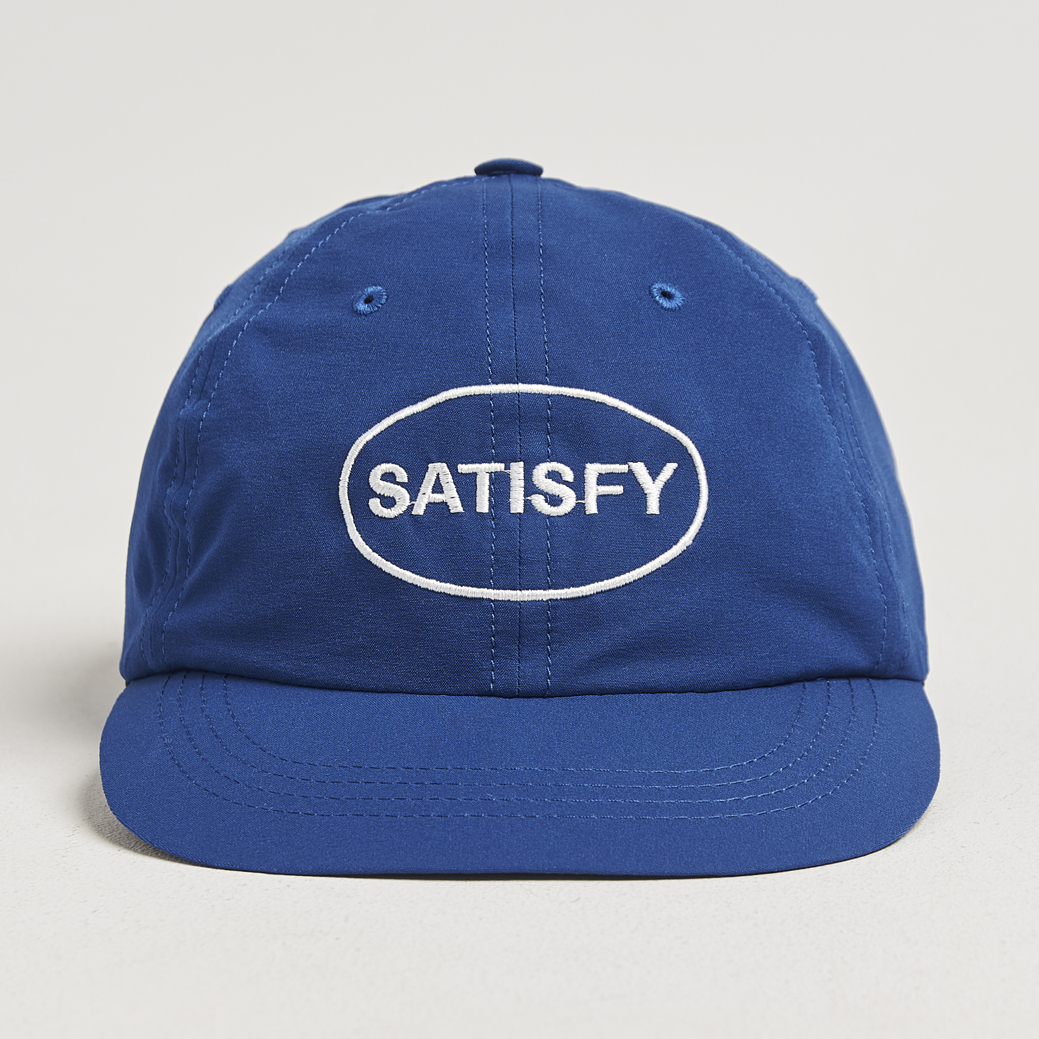 Satisfy PeaceShell Running Cap Blue at CareOfCarl.com