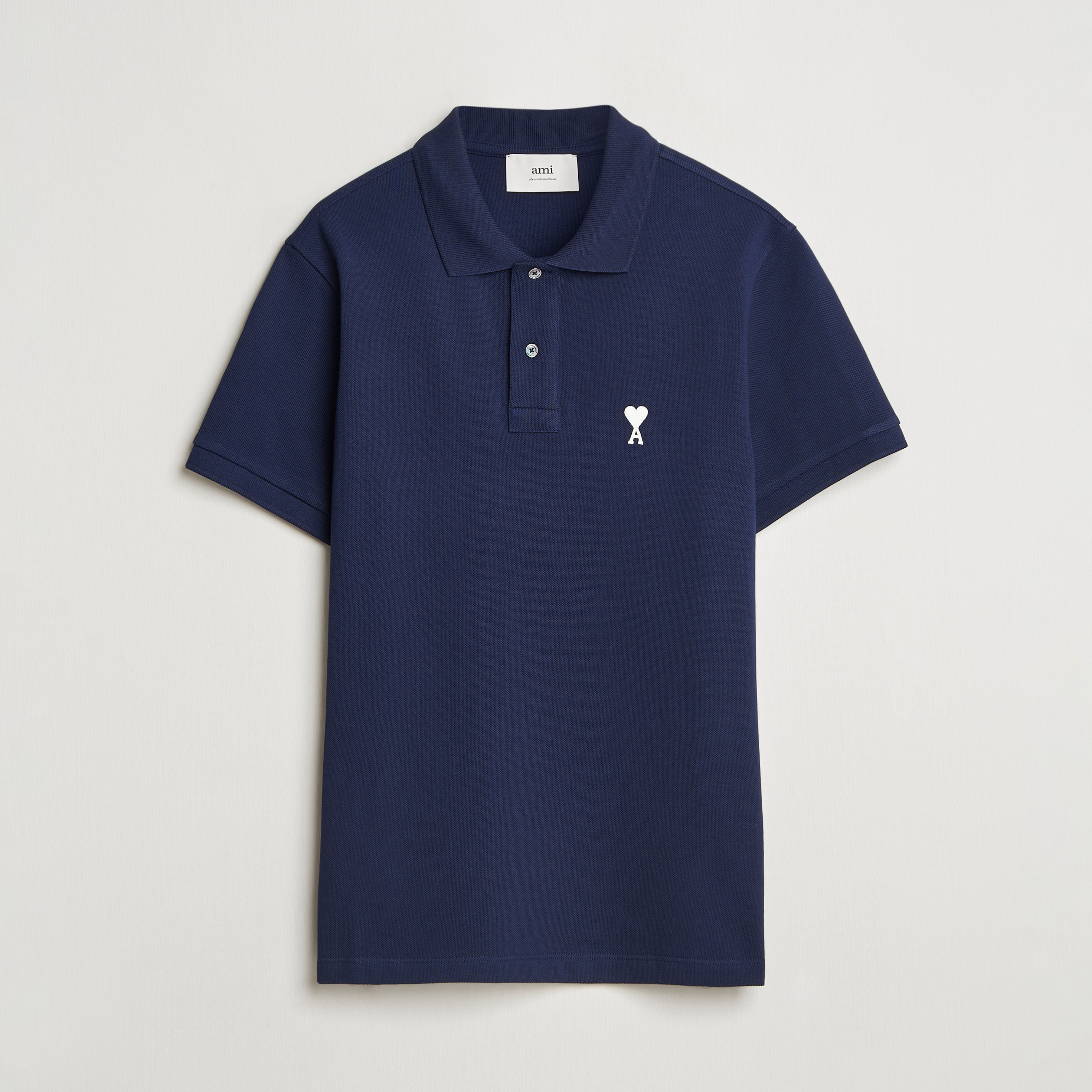 AMI Off White Heart Logo Polo Night Blue at CareOfCarl.com